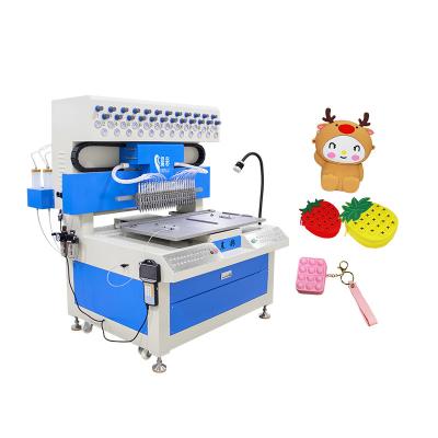 China 24 Colors Industrial Dispensing Machine Silicone PVC Toy Making Machine for sale