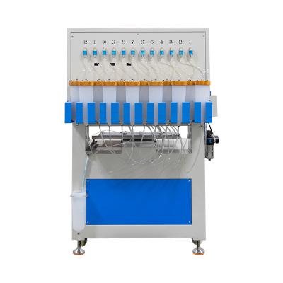Cina Macchina automatica per la realizzazione del logo del marchio per 12 colori Borsa di silicone in bianco blu in vendita