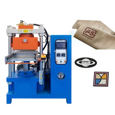 China 50T Automatic Vacuum Rubber Vulcanizing Machine for Garment Trademark for sale