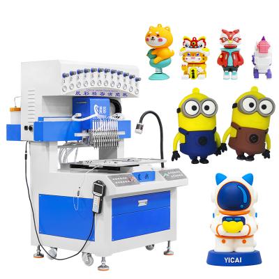 China Automatic 12 Colors Silicone Dispensing Machine with 0.01mm XYZ Accuracy for Energy Saving PVC Keychain Production for sale