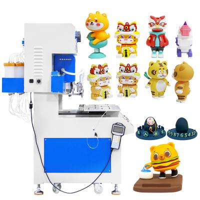 China Automatic 12 Colors Silicone Dispensing Machine with 0.01mm XYZ Accuracy for PVC Keychain and Phone Case Making for sale