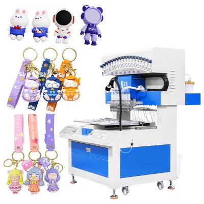 China Automatic 18 Colors PVC Keychain Making Machine with 0.01mm XYZ Accuracy and 220V Input Voltage for sale