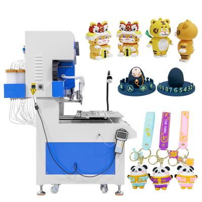 China Automatic 18 Colors PVC Keychain Making Machine with 0.01mm XYZ Accuracy and Energy Saving Silicone Dispensing Machine for sale