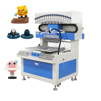 China 18 Colors Full-automatic Silicone Dispensing Machine with 0.01mm XYZ Accuracy for PVC Keychain Making for sale