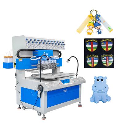 China 24 Colors 0.01mm XYZ Accuracy Energy Saving Silicone Dispensing Machine for PVC Keychains and Coasters for sale