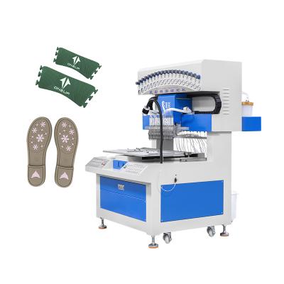China Automatic 18 Colors Silicone Dispensing Machine with 0.01mm XYZ Accuracy for Energy Saving PVC Keychain Making for sale