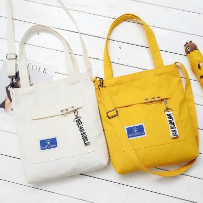 China Unique design canvas diagonal Korean fashion shoulder bag handbag with ribbon for sale
