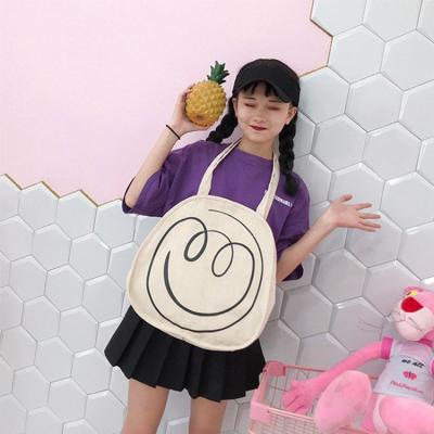 China Spring / summer 2018 new Japanese smiley face printed canvas bag women shoulder bag art handbag for sale