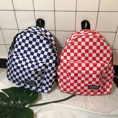 China 2018 new hip-hop fashion checkerboard circle label campus backpack for high school students for sale
