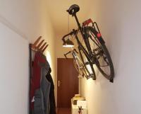 China Standard Bicycle Wall Mount Bike Rack Bracket with Pedal Support Function for sale