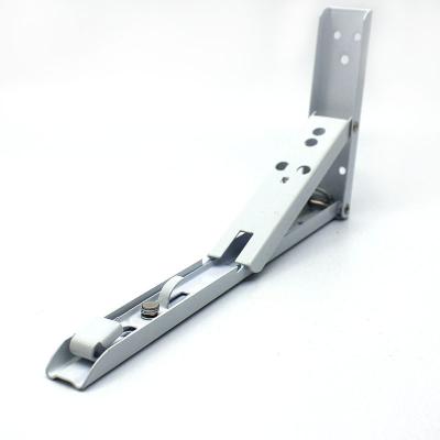 China Custom Triangle Spring Folding Shelf Locking Hinge Bracket for Wall Mounting in Silver for sale