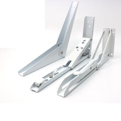 China Custom Triangle Spring Folding Shelf Locking Hinge Bracket for Wall Mounting in Silver for sale