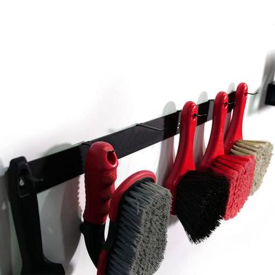 Cina Porta spazzole per dettagli montato a parete 6 ganci durevoli per i dettagli essenziali dell'auto in vendita