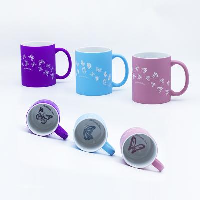China Memorable 330ml souvenir coffee mug with laser engraving and inside decal fired for IP customer for sale