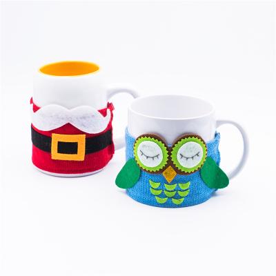 China ODM Ceramic Holiday Celebrations Christmas Mug With Cup Sleeve for sale
