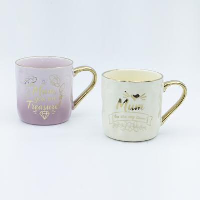 China Decal Fired Ceramic Mug with Gold Handle for Festival Celebration for sale