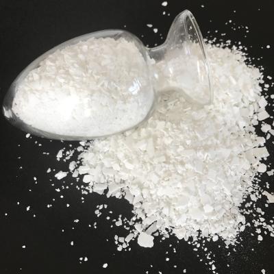 China 74% Purity Chloride Dihydrate Flakes REACH Safe Desiccant For Drying And Moisture Absorption for sale