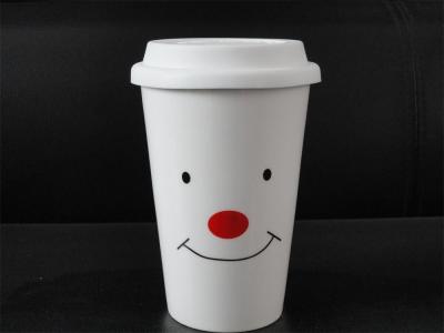 China ceramic travel coffee mug with silicone lid for sale