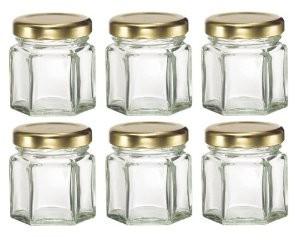 China hexagonal glass jars with screw cap for honey for sale