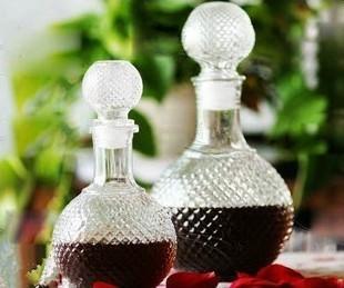 China Unique shaped red wine glass bottle made in china for sale