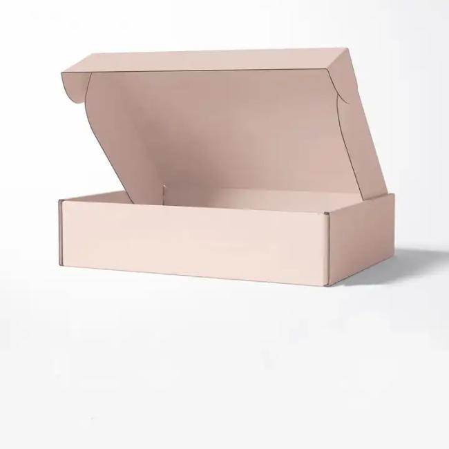 Assorted corrugated mailer boxes in different colors and sizes