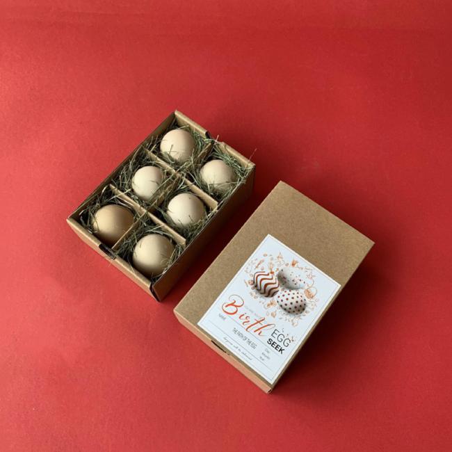 Egg packaging box with kraft paper material