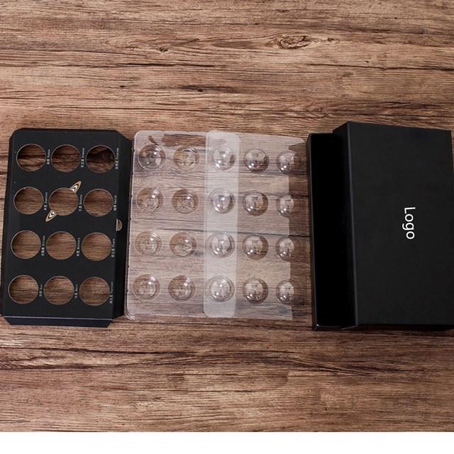 Assorted custom chocolate boxes displaying different finishing options