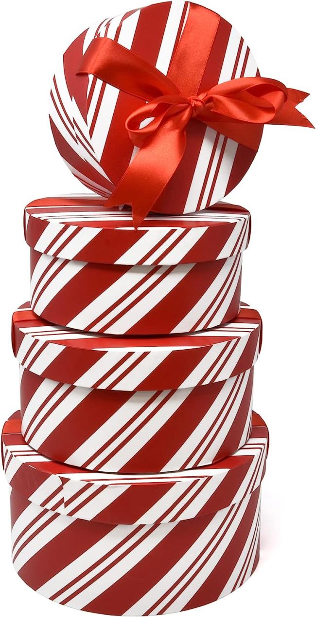 Christmas gift boxes - side view showing cylindrical shape and nesting capability