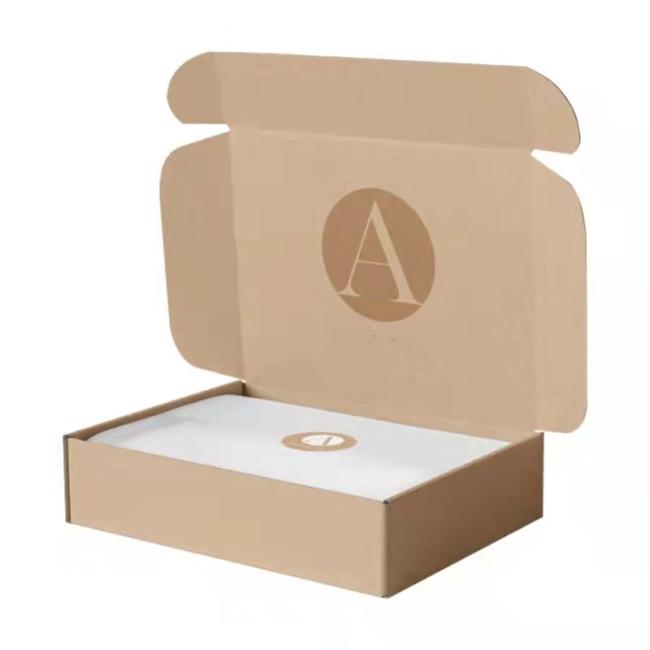 Colorful corrugated mailer boxes for dresses displayed in various sizes and designs