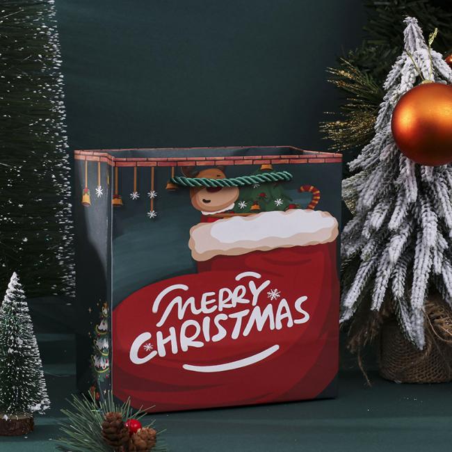Colorful Christmas gift box with ribbon - front view