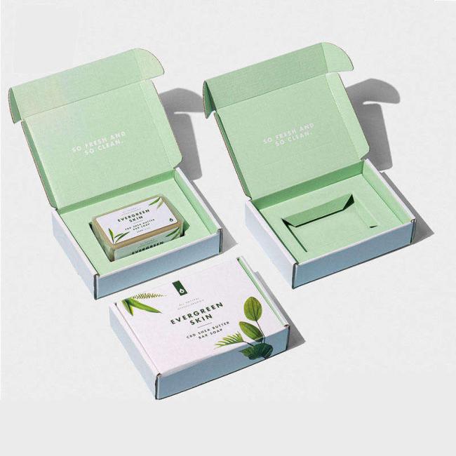 Foldable corrugated mailer box for makeup products