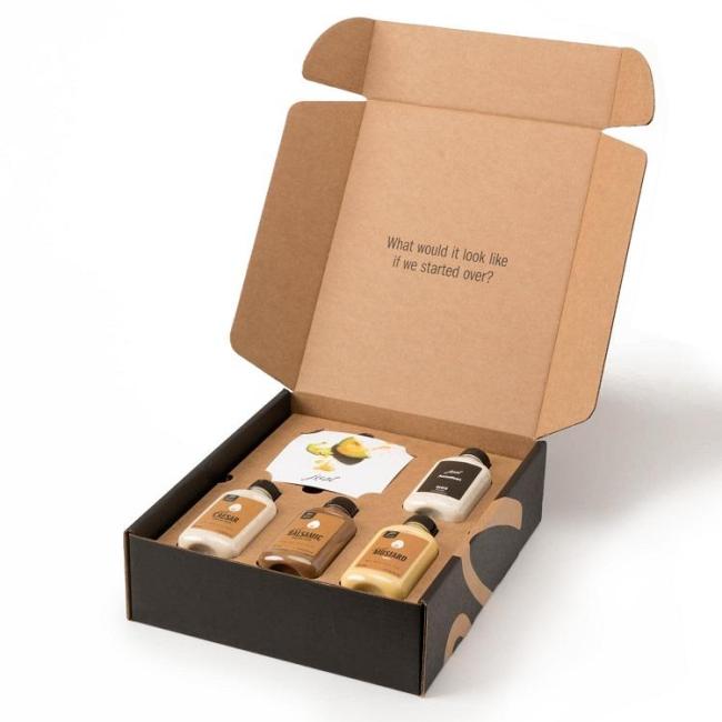 Multiple colored mailer boxes displayed together