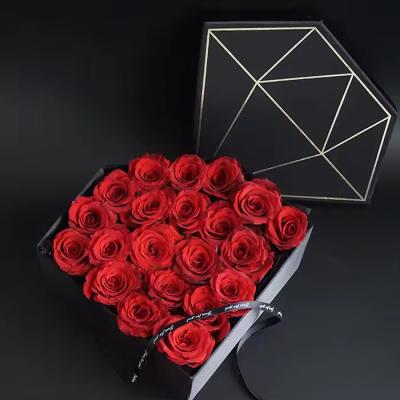 China UV Coating Printing Florist Cardboard Boxes Pink Pentagon Cardboard Rose Gift Box for sale