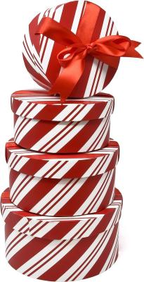 China Craft Christmas Round Nesting Gift Boxes With Lids 4 Pack Red And White For Candy Cookie for sale