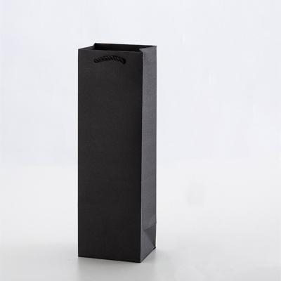 China Drawstring Handle Recyclable Paper Kraft Wine Bottle Bags Coated Paper Matt Laminantion for sale