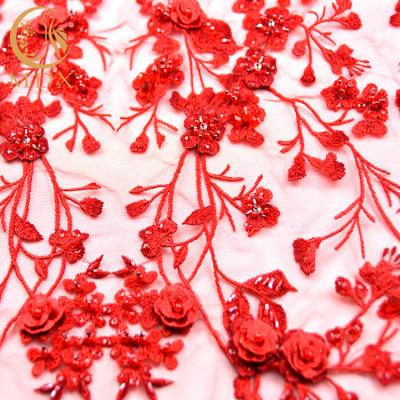 中国 豪華な3D刺繍のレースのアップリケの手細工のビーズの赤い色のレース 販売のため