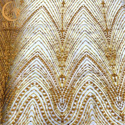 Cina Gli zecchini brillanti hanno ricamato Mesh Lace/pizzo dorato 80% della perla di nylon in vendita