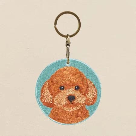 Custom embroidered keychain with vibrant colors and detailed design