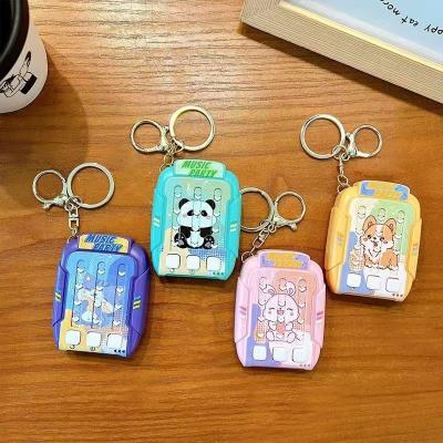 China Customized Handbag Toys Keychain Handheld Game Console Keychain Lightweight for sale
