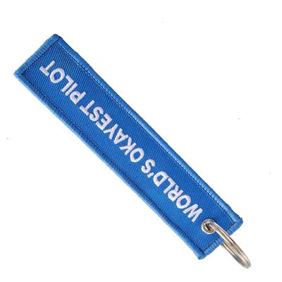 China Humoristische Pilot Design Sleutelhangers voor evenementen - Op maat geborduurde souvenirs met multi-kleur & logo opties / Promotie cadeautjes Te koop