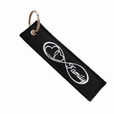 China Ewig familie sleutelhanger cadeau - Wit geborduurd hart symbool en metaal ring stof sleutelhanger Te koop