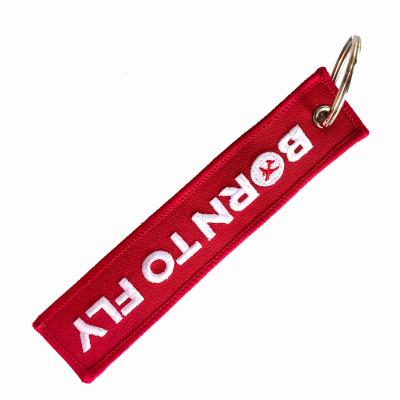 China Statement Keychain Accessory - Red/White Embroidery Design, Durable Metal Ring & Colorfast Threads for sale