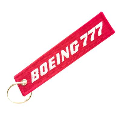 China Regalo para os entusiastas da aviação - BOEING 777 bordado com chaveiro dourado à venda