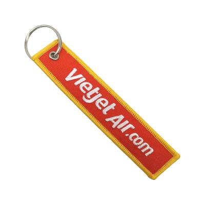 China VietJet Air Custom geborduurde sleuteltakken Hoogprecisie roestvrij zink legering ring Te koop