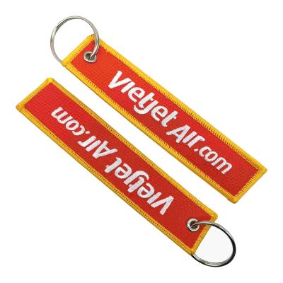 China VietJet Air Custom geborduurde sleuteltakken Hoogprecisie roestvrij zink legering ring Te koop
