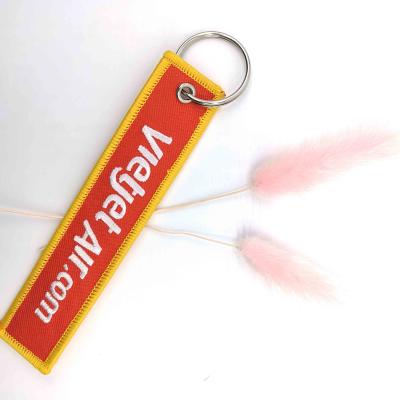 China VietJet Air Custom geborduurde sleuteltakken Hoogprecisie roestvrij zink legering ring Te koop