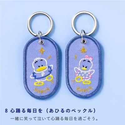 中国 変なダック・デュオ 刺身キーチェイン - 日本の恋のトークン - 音楽音と星のアクセント 販売のため