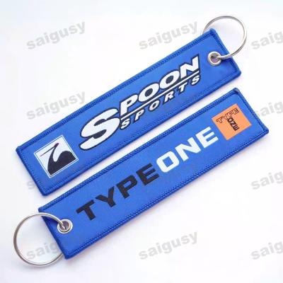 China Regalo Personalizado para Amantes de los Coches - Llavero Bordado con Costura Premium y Diseño Compacto en venta