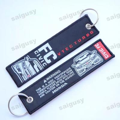 China Premium Custom Car Embroidered Keychain - Anime-Inspired Designs + Heavy-Duty Metal Ring + Personalized Pattern Options for sale