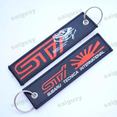 China Handmade Subaru Keychain – Dynamic STI Embroidery & Retro Vibes – Customizable Auto Accessory for sale